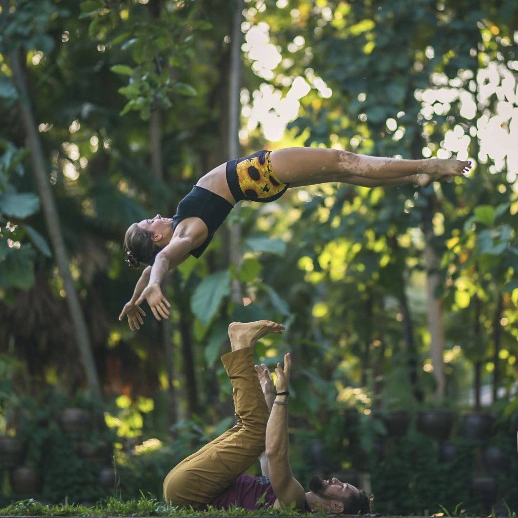 What is AcroYoga and how to practice? | YogaSlackers