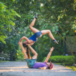 What is AcroYoga and how to practice? | YogaSlackers